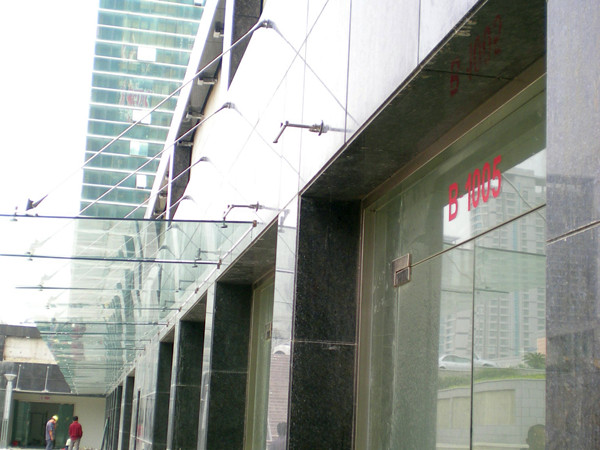 frameless glass canopy system